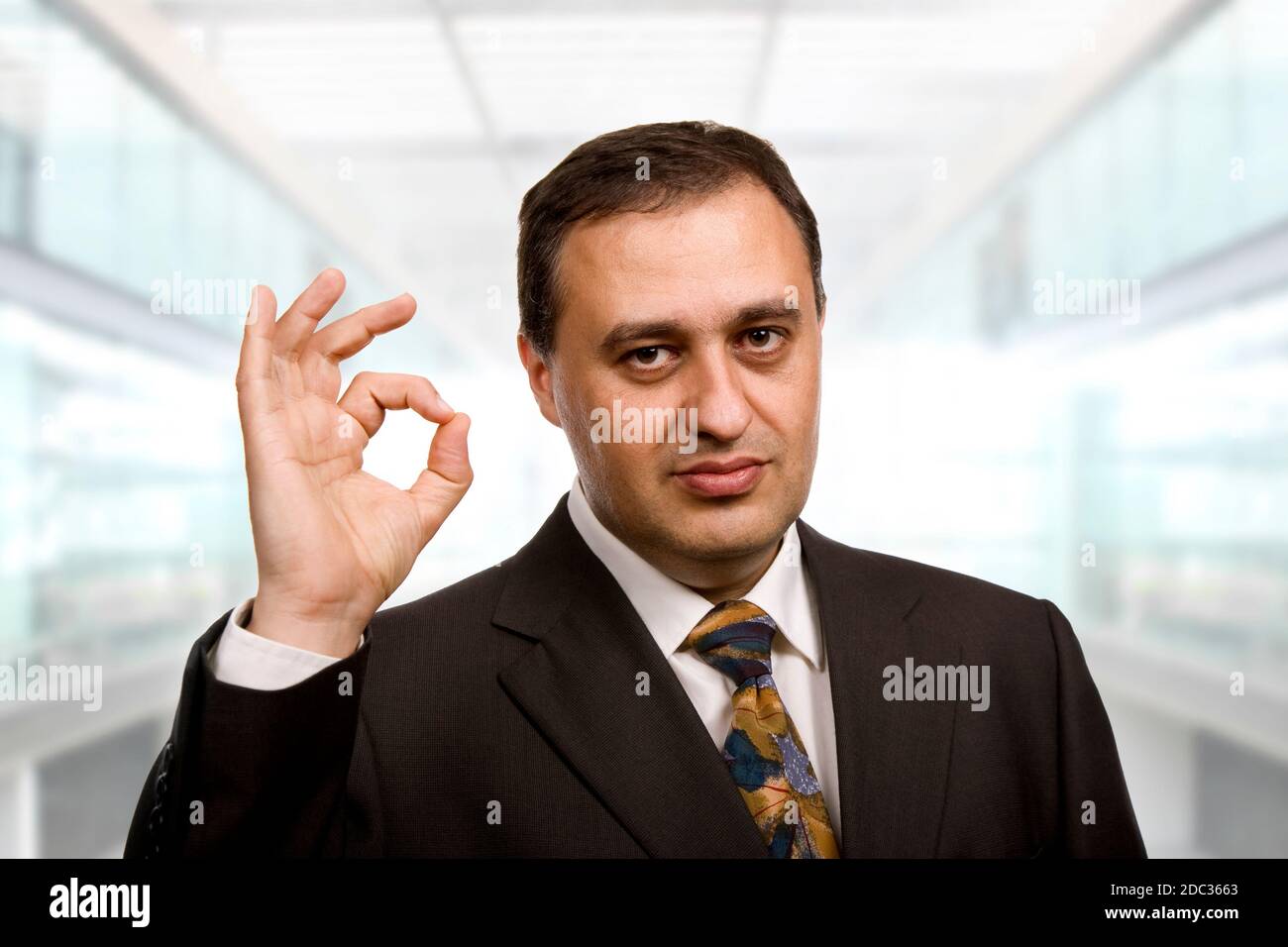 Young businessman showing his hand at the office Stock Photo - Alamy