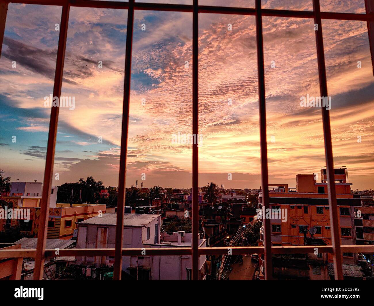 Pictures of beautiful sunset with the houses in background and behind ...