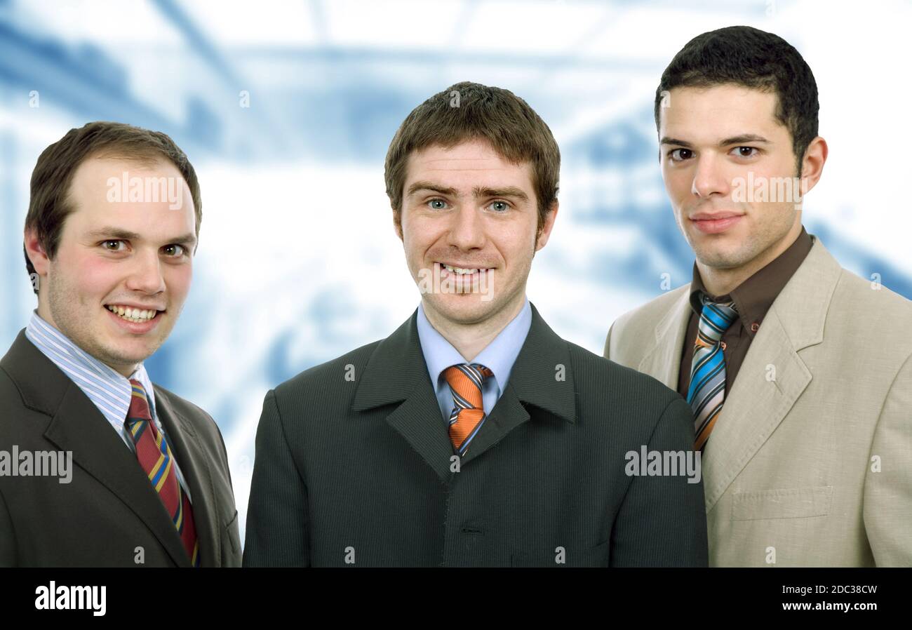 three happy business men together as a team Stock Photo - Alamy