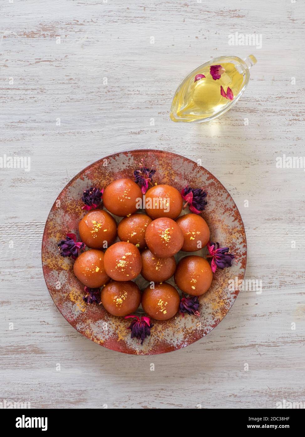 Indian sweets orange hi-res stock photography and images - Alamy