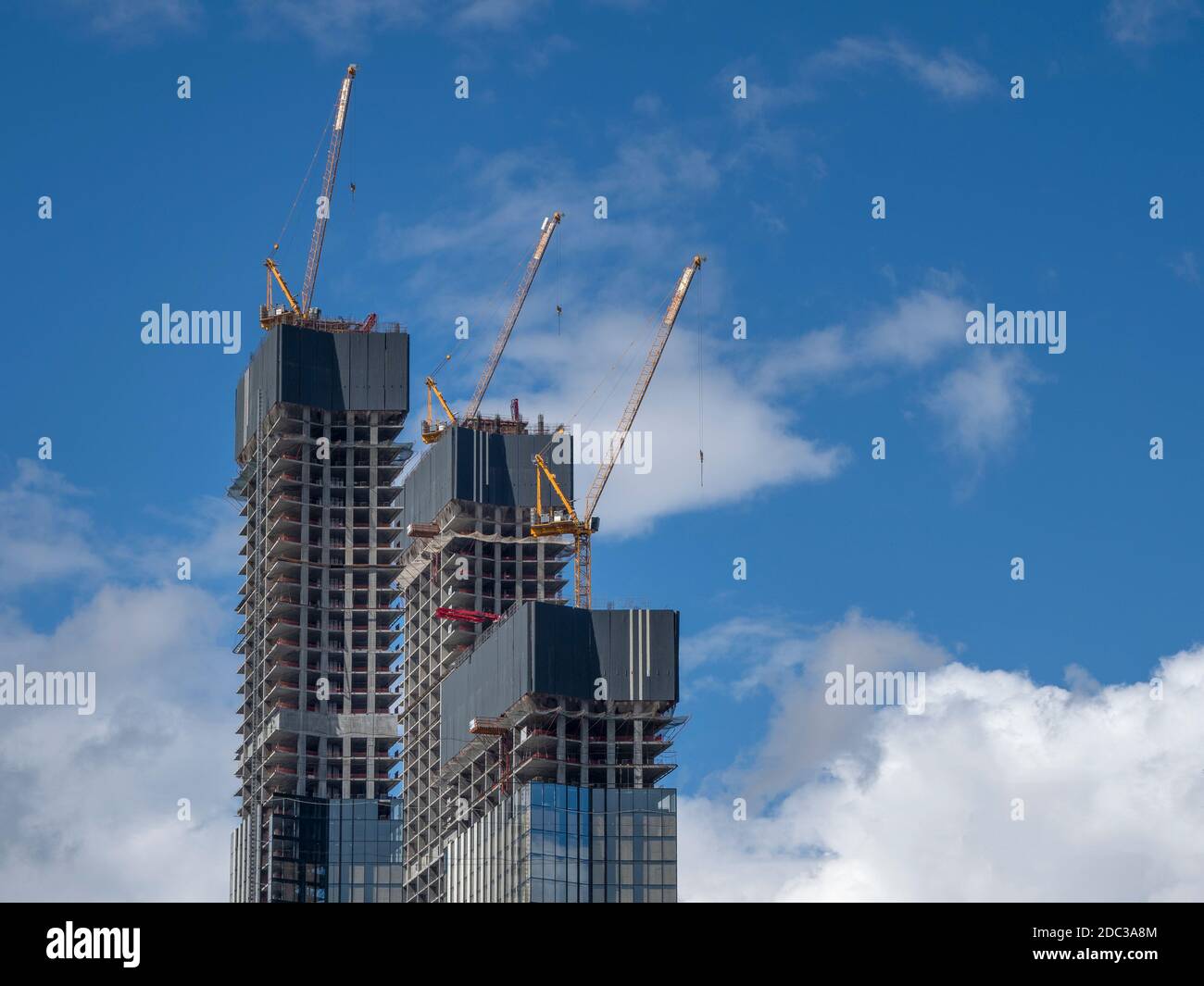 Construction work site and high rise building. High-rise building under ...