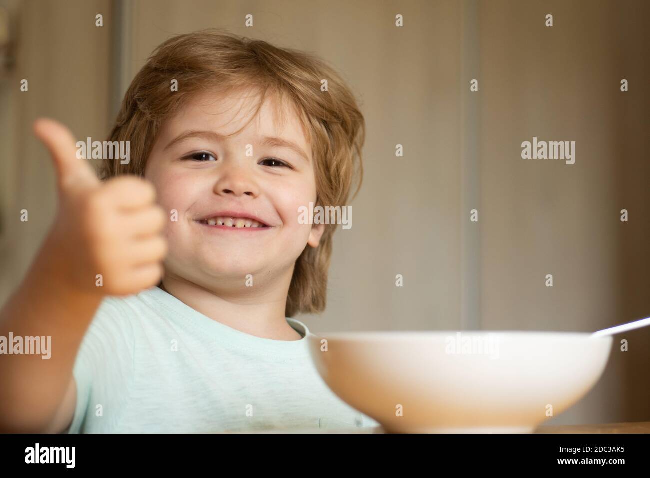 Parenthood. Little boy - ecology Food concept. Portrait of beautiful ...