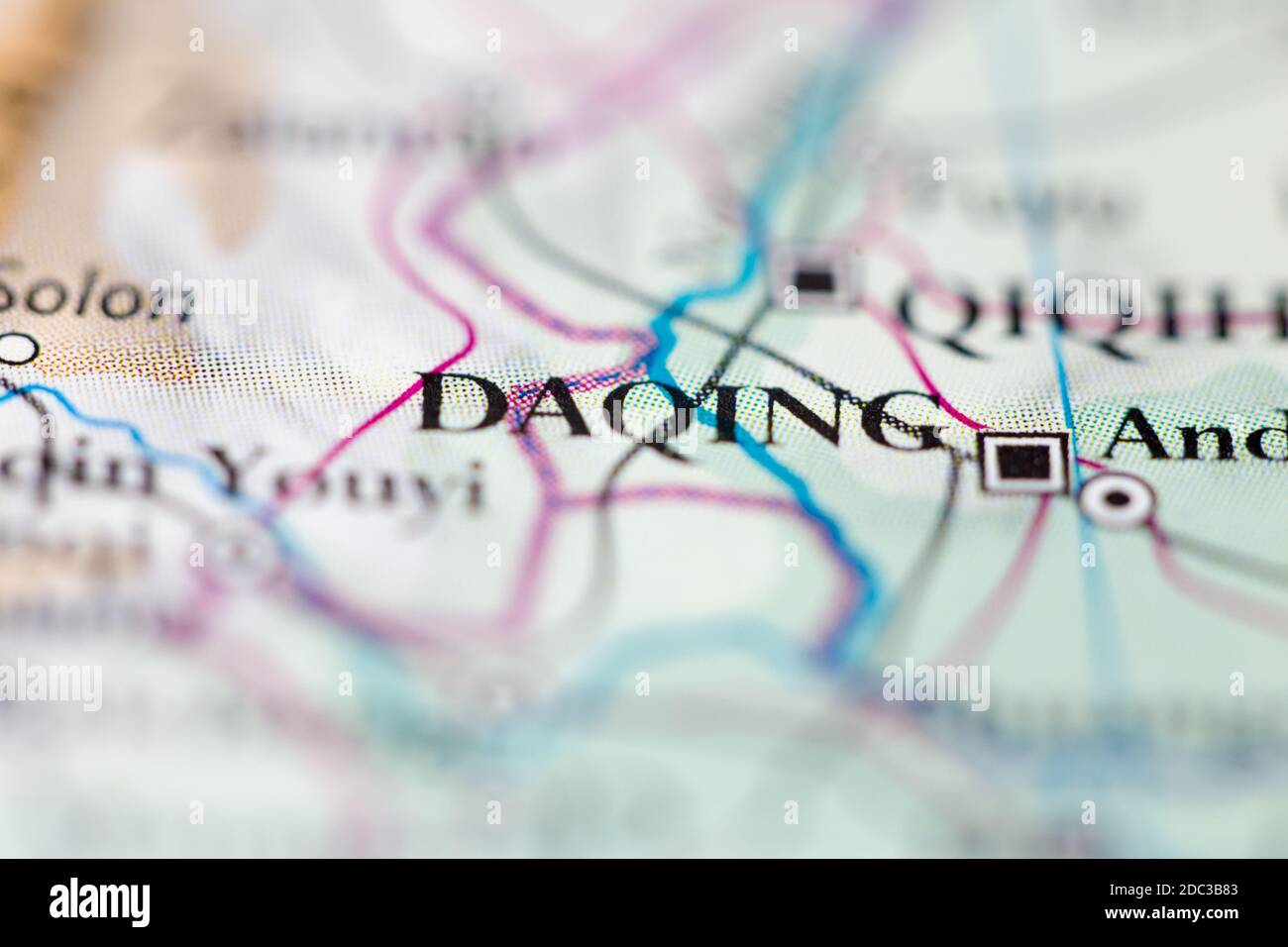Shallow depth of field focus on geographical map location of Daqing ...