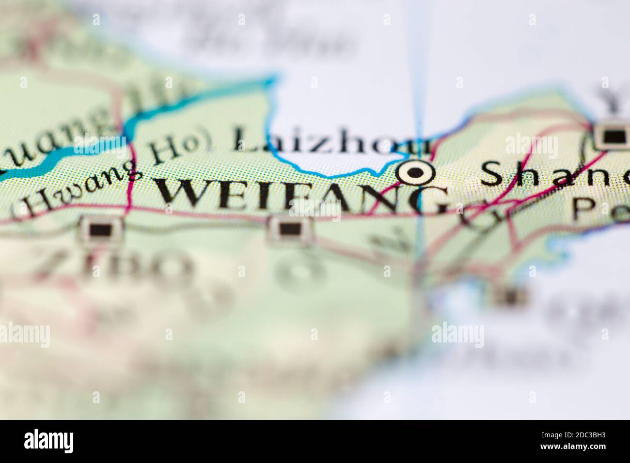 Shallow depth of field focus on geographical map location of Weifang ...