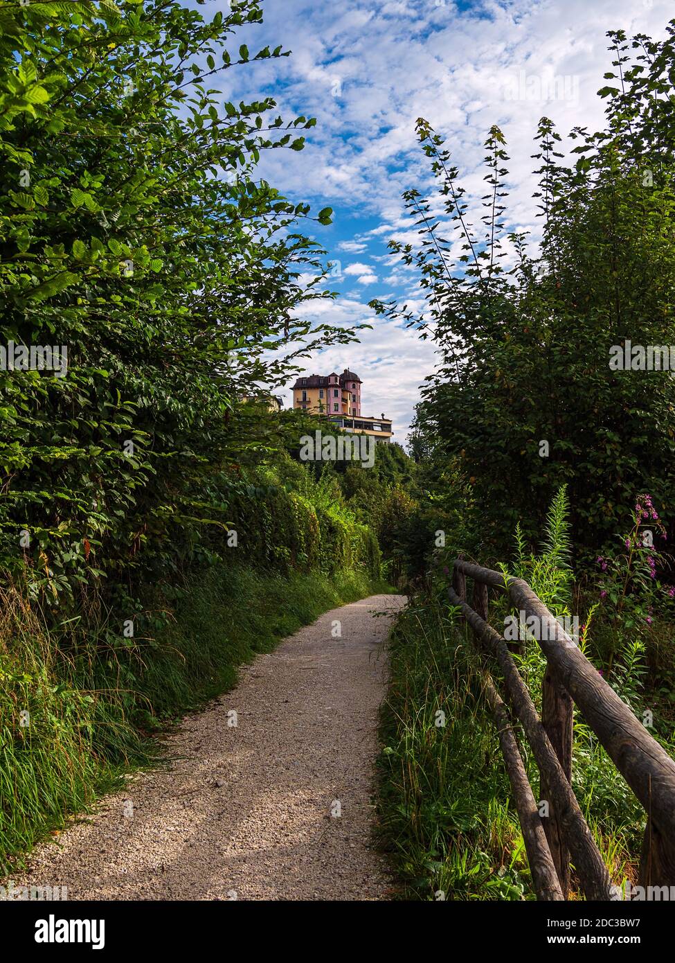 Footpath with trees and building in Berchtesgaden, Germany Stock Photo ...