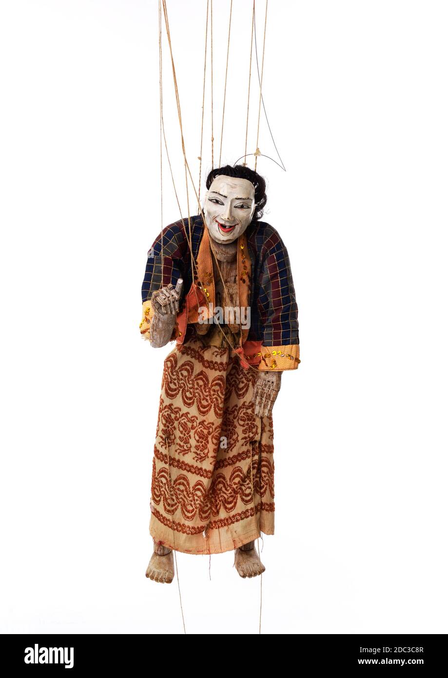 Suspended by wires ancient Asian wooden marionette representing women ...