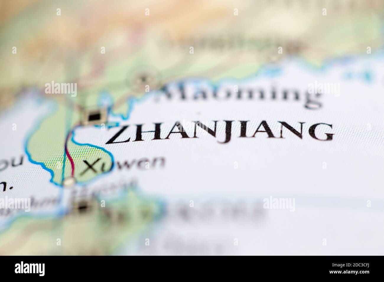 Shallow depth of field focus on geographical map location of Zhanjiang ...