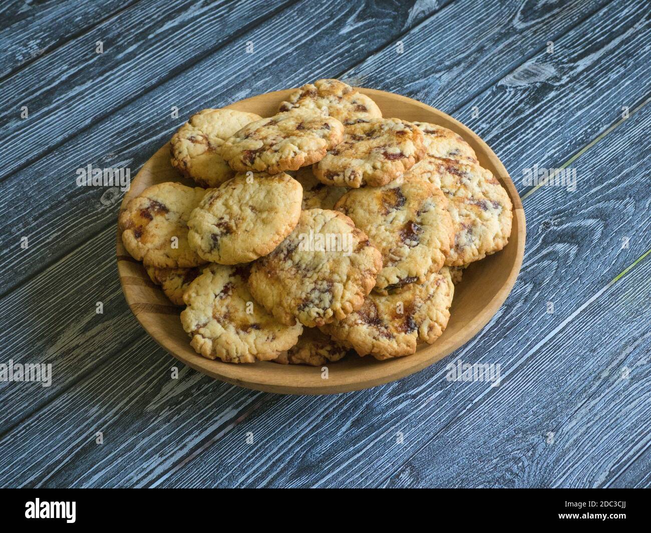 Shortbread with dates on a dark wooden surface Stock Photo - Alamy