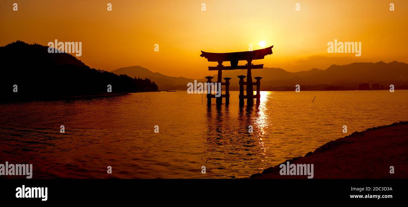 Miyajima orange Great Torii Gate at sunset in Hiroshima Bay, western ...