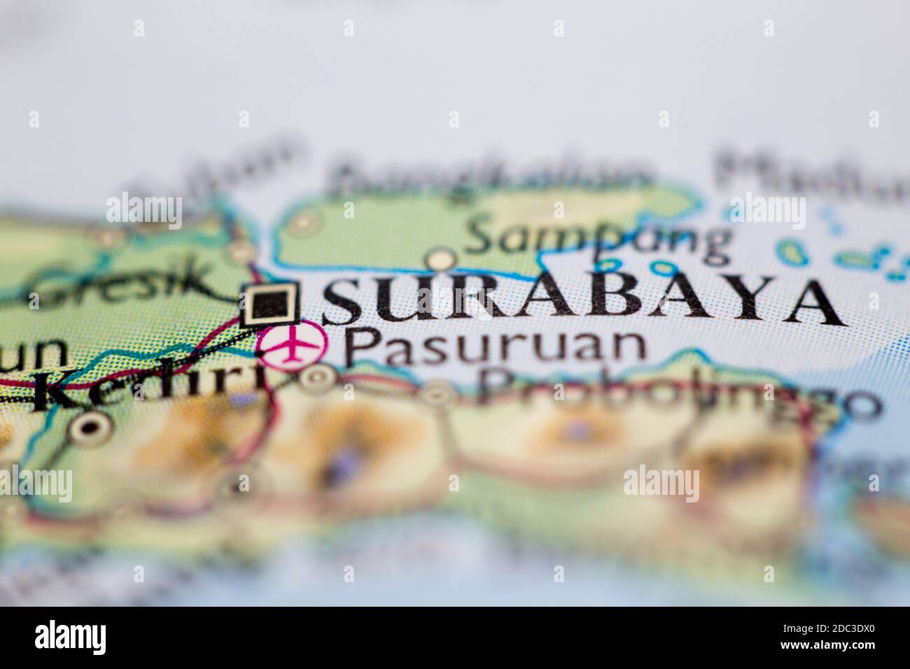 Shallow depth of field focus on geographical map location of Surabaya ...