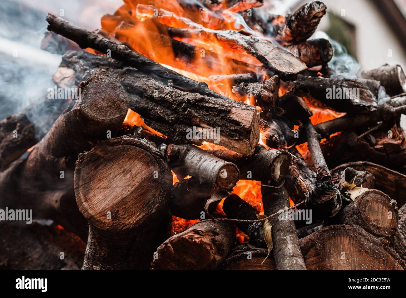 Fire burning tree branches, ember glowing Stock Photo - Alamy