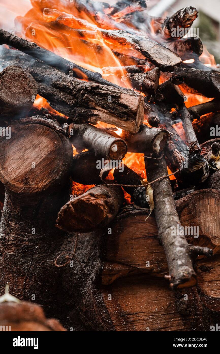Fire burning tree branches, ember glowing Stock Photo - Alamy