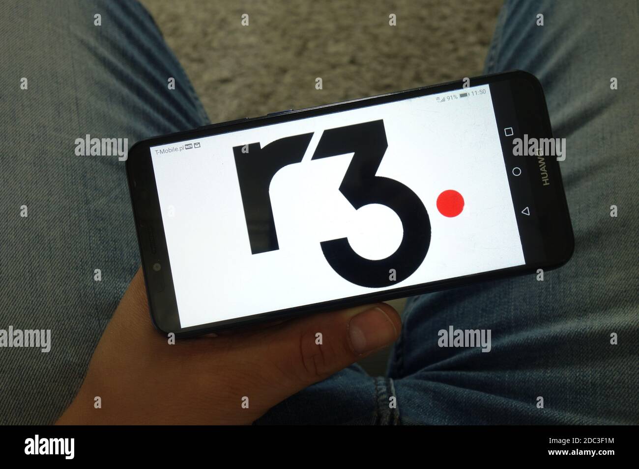 KONSKIE, POLAND - June 29, 2019: R3 company logo displayed on mobile ...