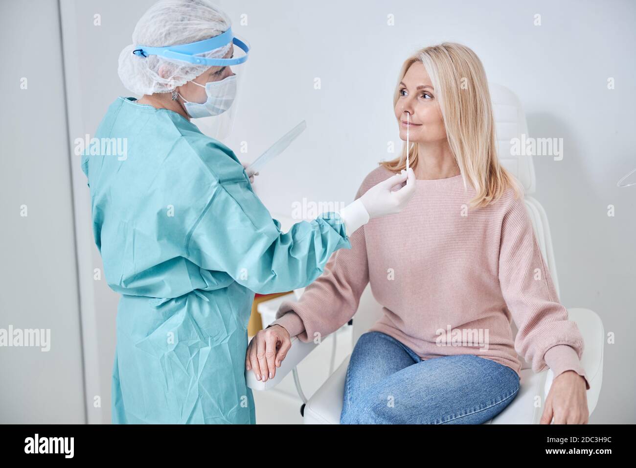 Woman screened hospital hi-res stock photography and images - Alamy