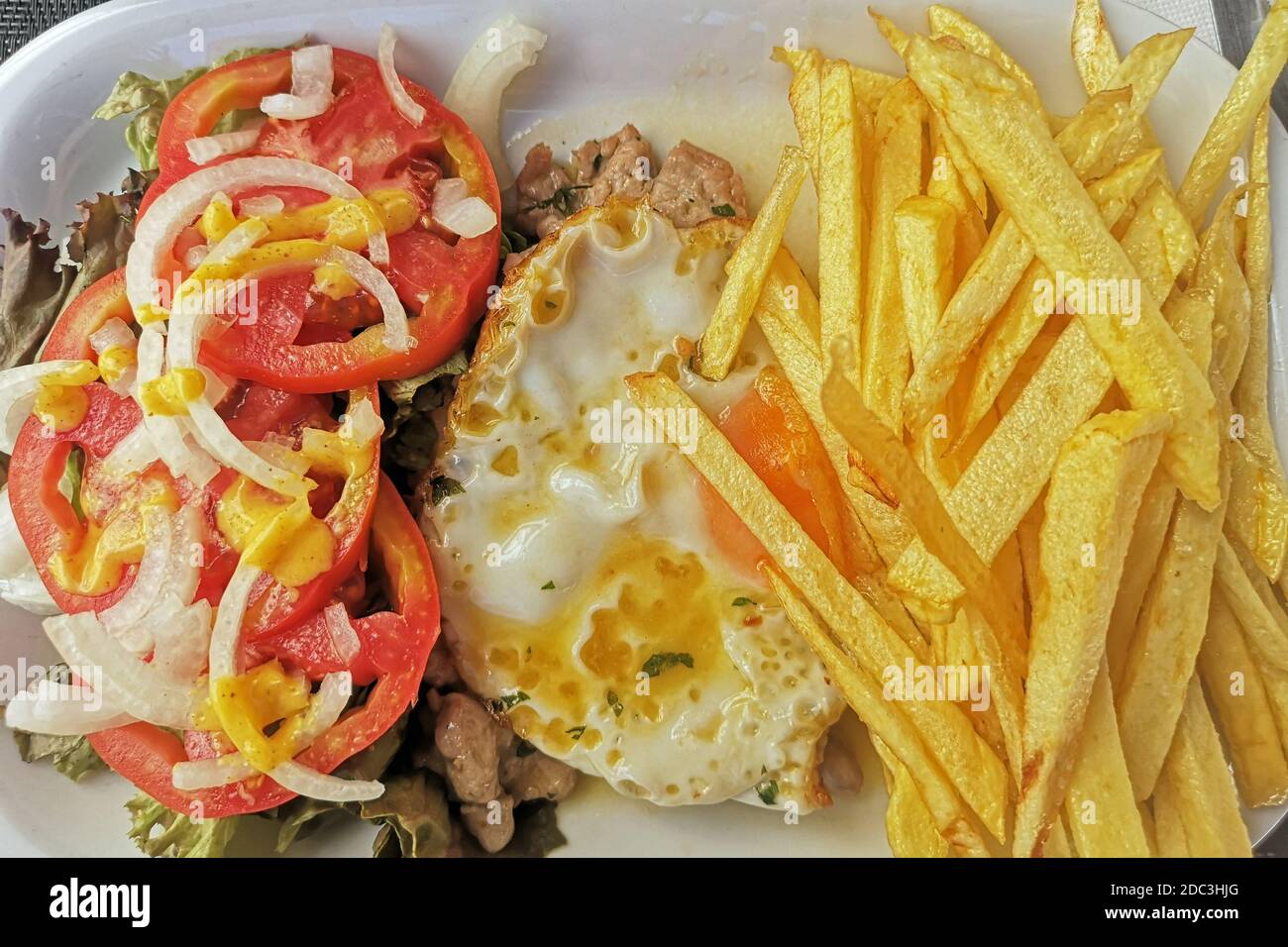 Bitoque, a typical portuguese dish Stock Photo - Alamy