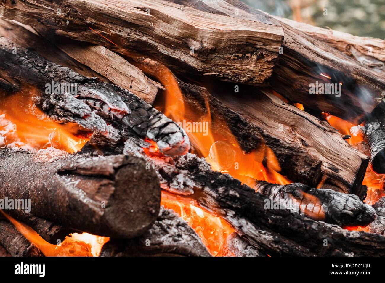 Fire burning tree branches, ember glowing Stock Photo - Alamy