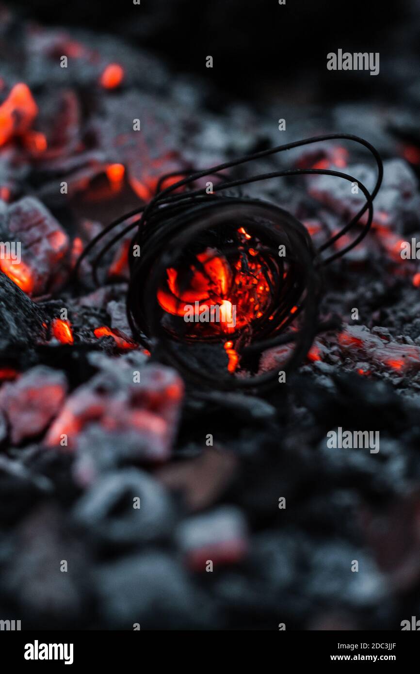 Fire burning tree branches, ember glowing Stock Photo - Alamy