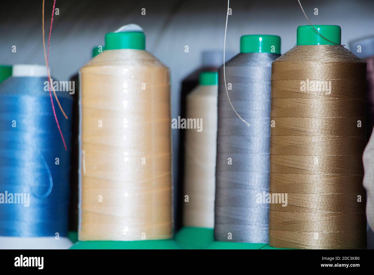 Colorful reels with threads, backgrounds, images related to the tailor ...