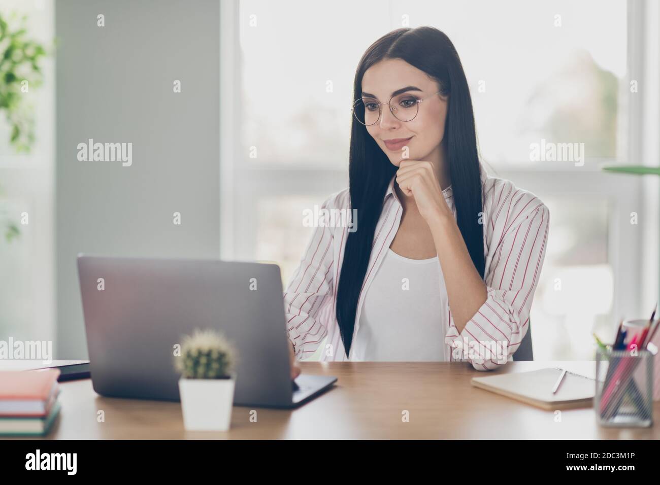 Photo of smart business lady sitting table looking laptop reading ...