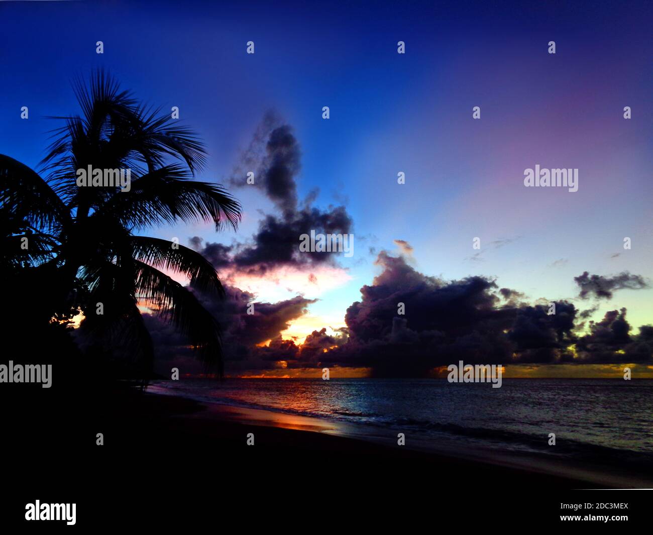 Sunset at "Plage de la Perle" ("Pearl Beach") in Rifflet, Guadeloupe ...