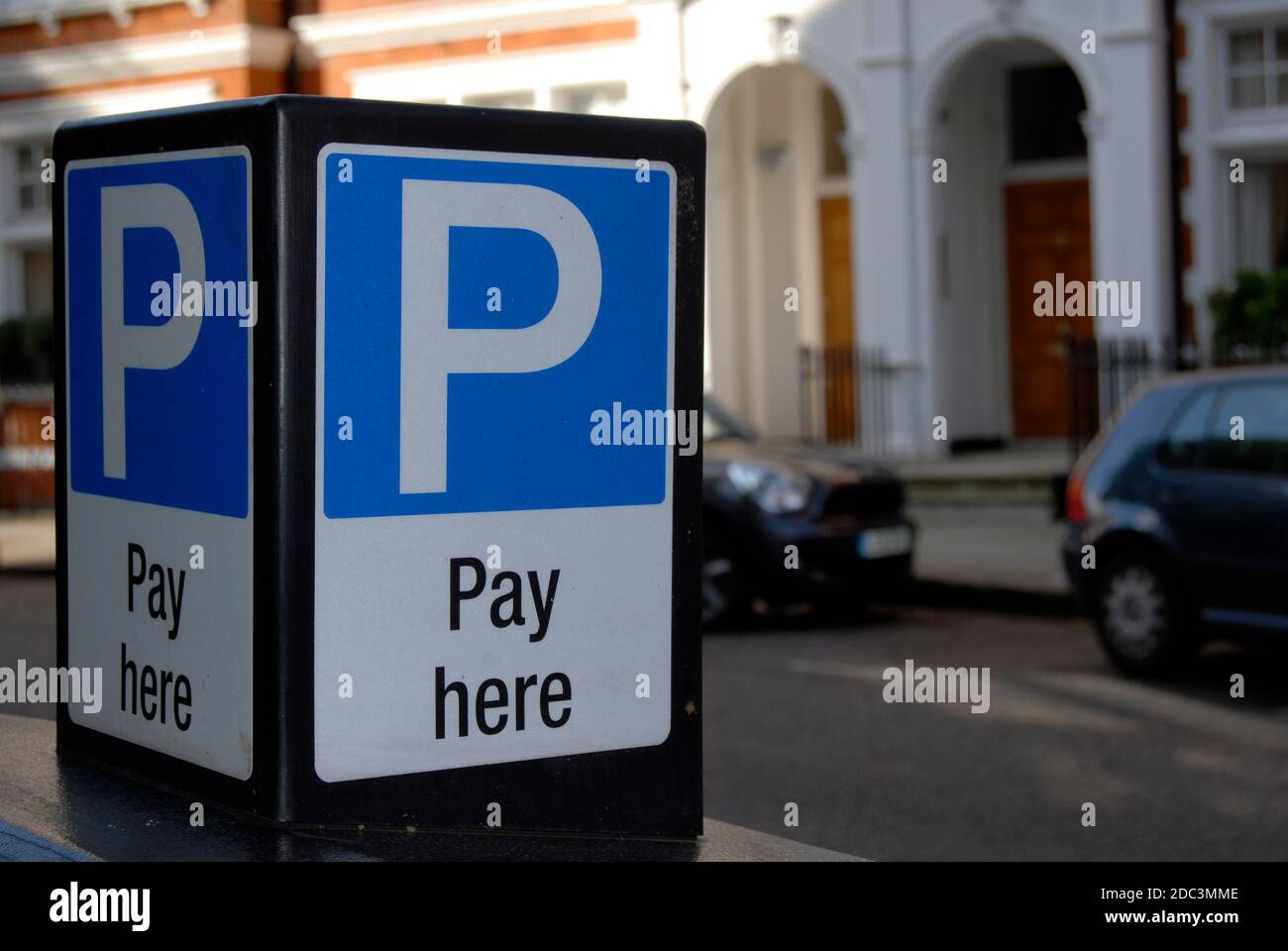 Pay Here Street Sign Stock Photo - Alamy