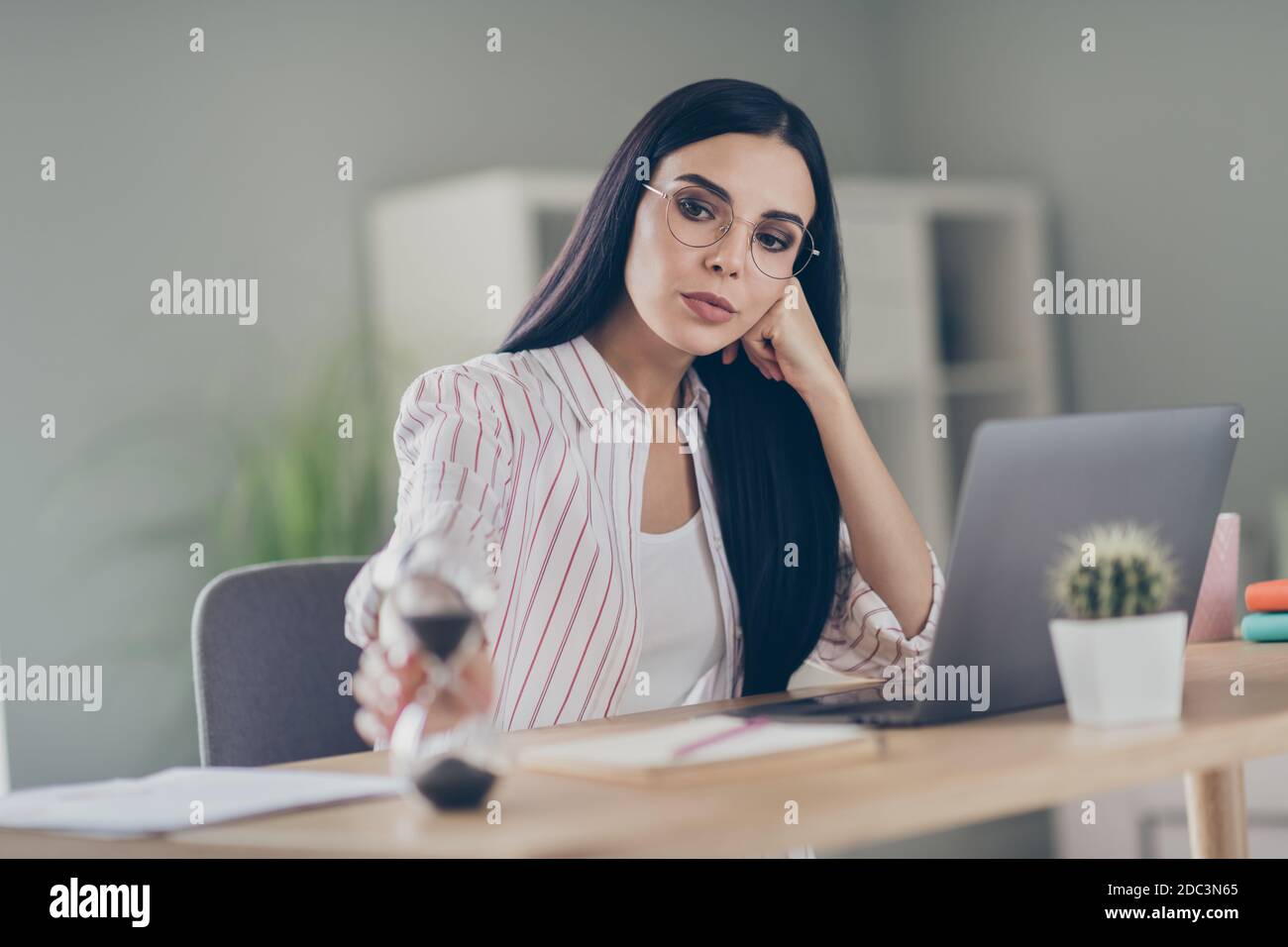 Photo of smart lady accountant sitting table wearing glasses counting ... Photo of smart lady accountant sitting table wearing glasses counting ...