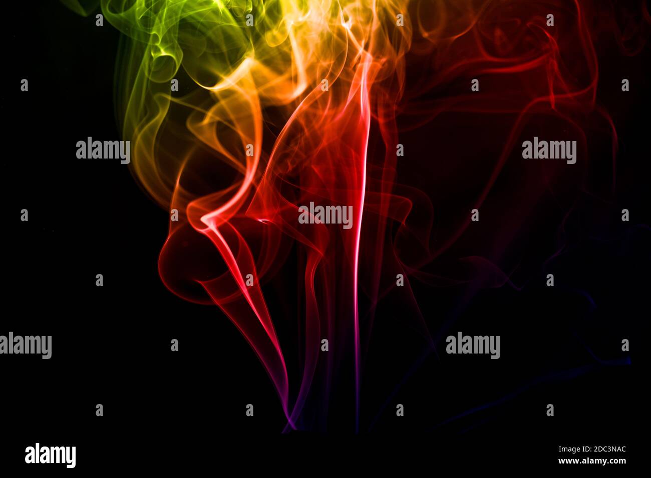 Close-Up colorful Smoke over black background for overlay design Stock ...