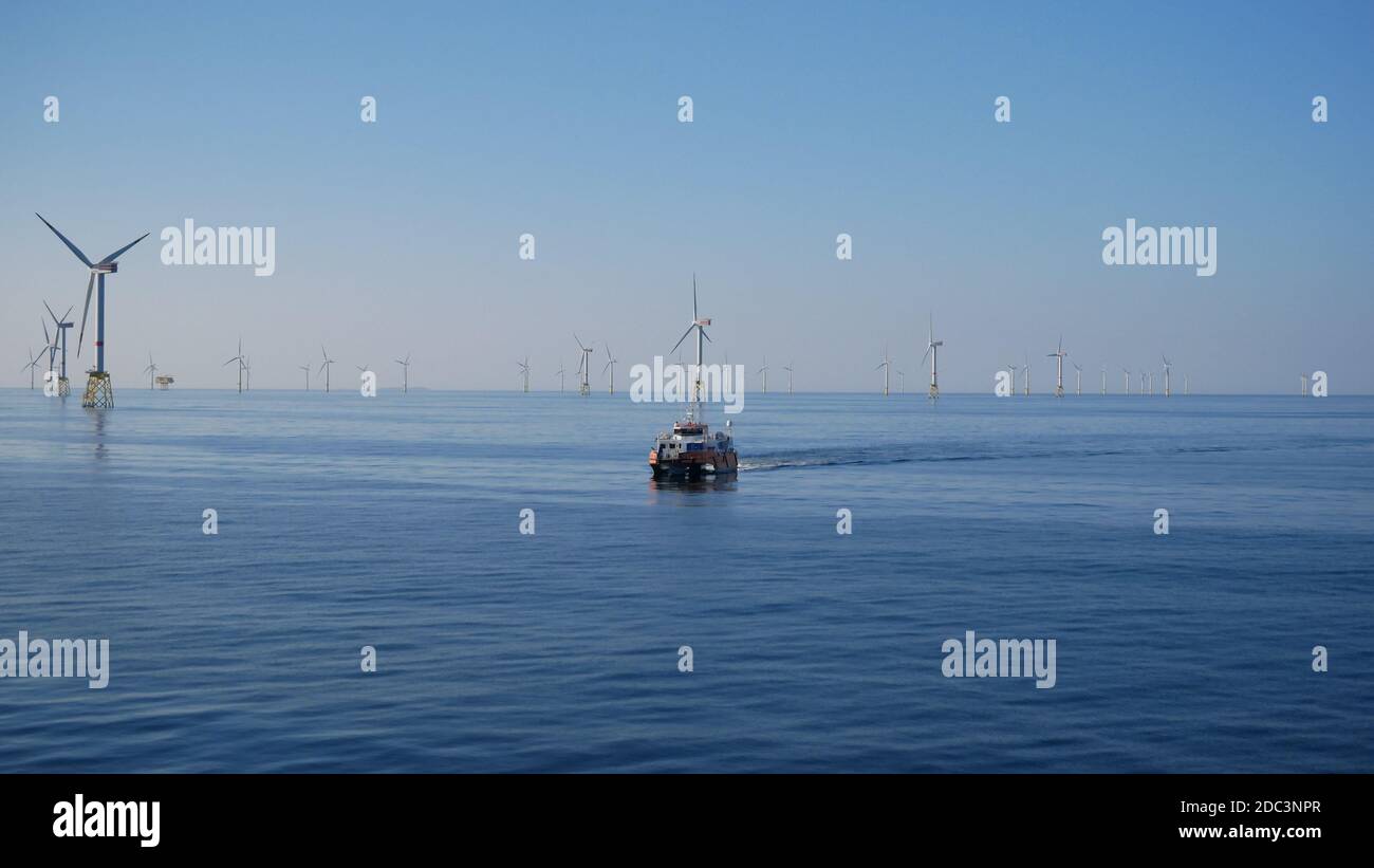 Crew transfer vessel in offshore wind farm in German north sea Stock ...