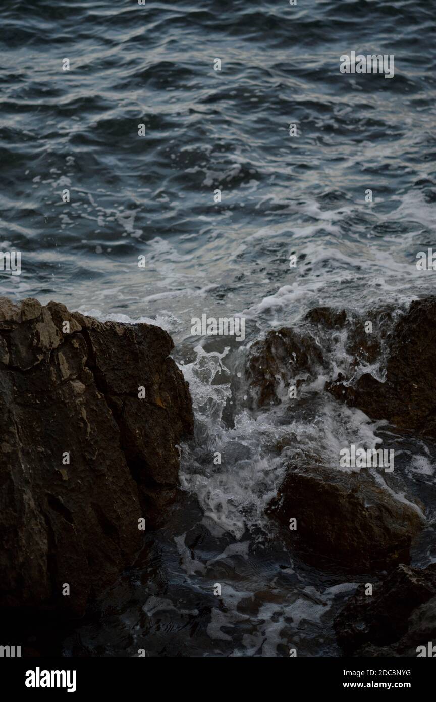 Sea waves crashing into rocks.Sea waves crashing into rocks. Storm at ...