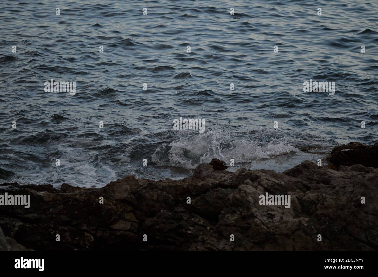 Sea waves crashing into rocks.Sea waves crashing into rocks. Storm at ...