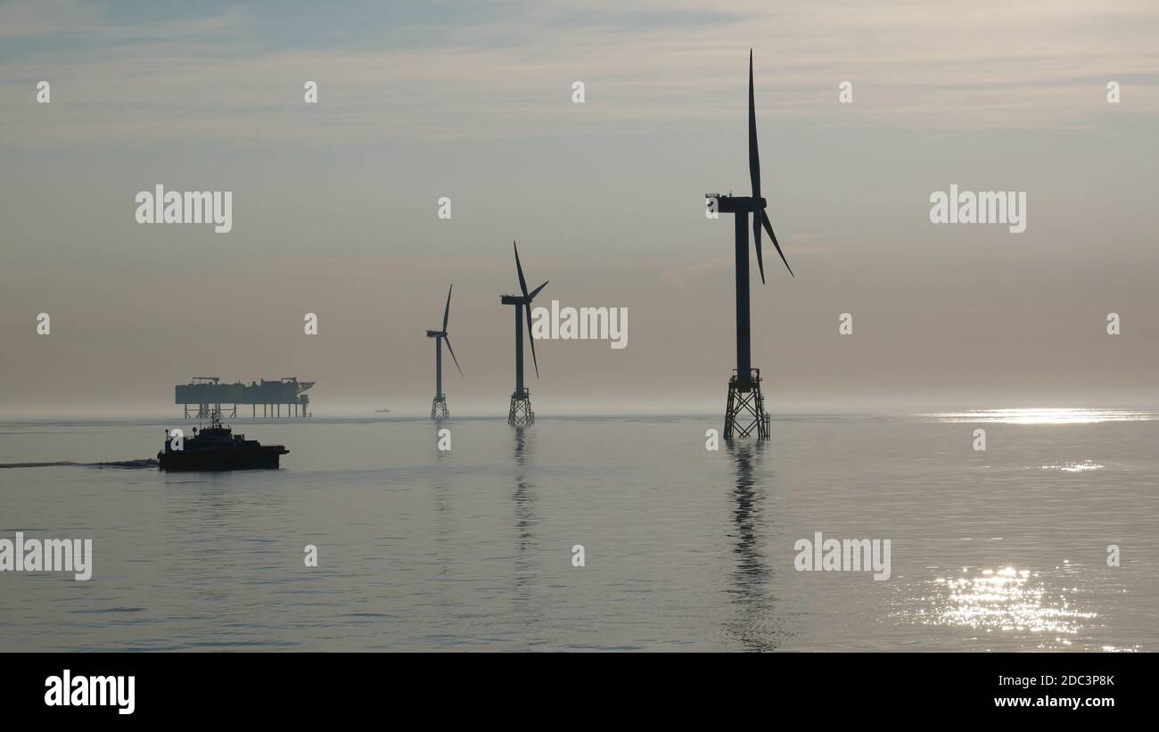 Offshore wind farm wind trubines with CTV in German north sea during ...