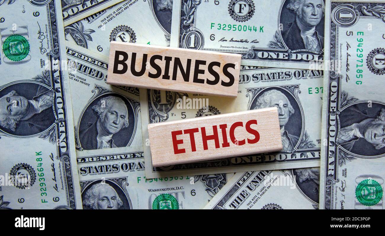 Male hand placing a blocks with word 'code' on top of a blocks tower ...