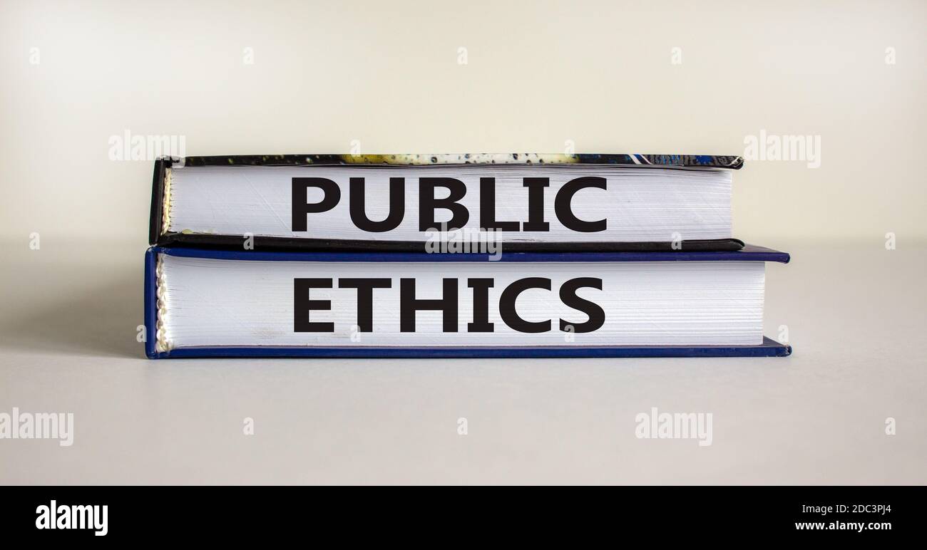 Public ethics and business concept. Books with words 'public ethics ...