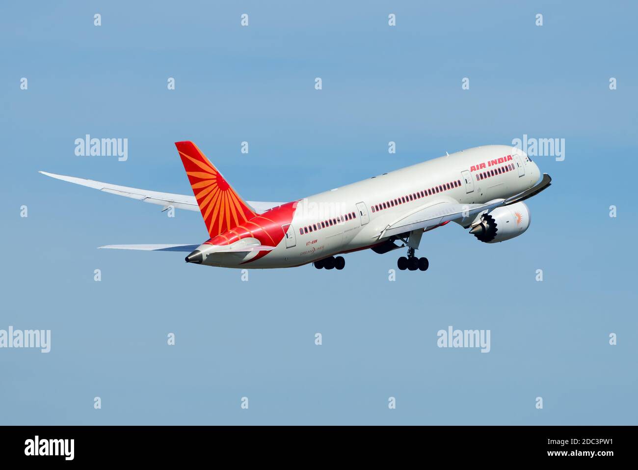 Air India Boeing 787 airplane flying in front of blue sky. Aircraft ...