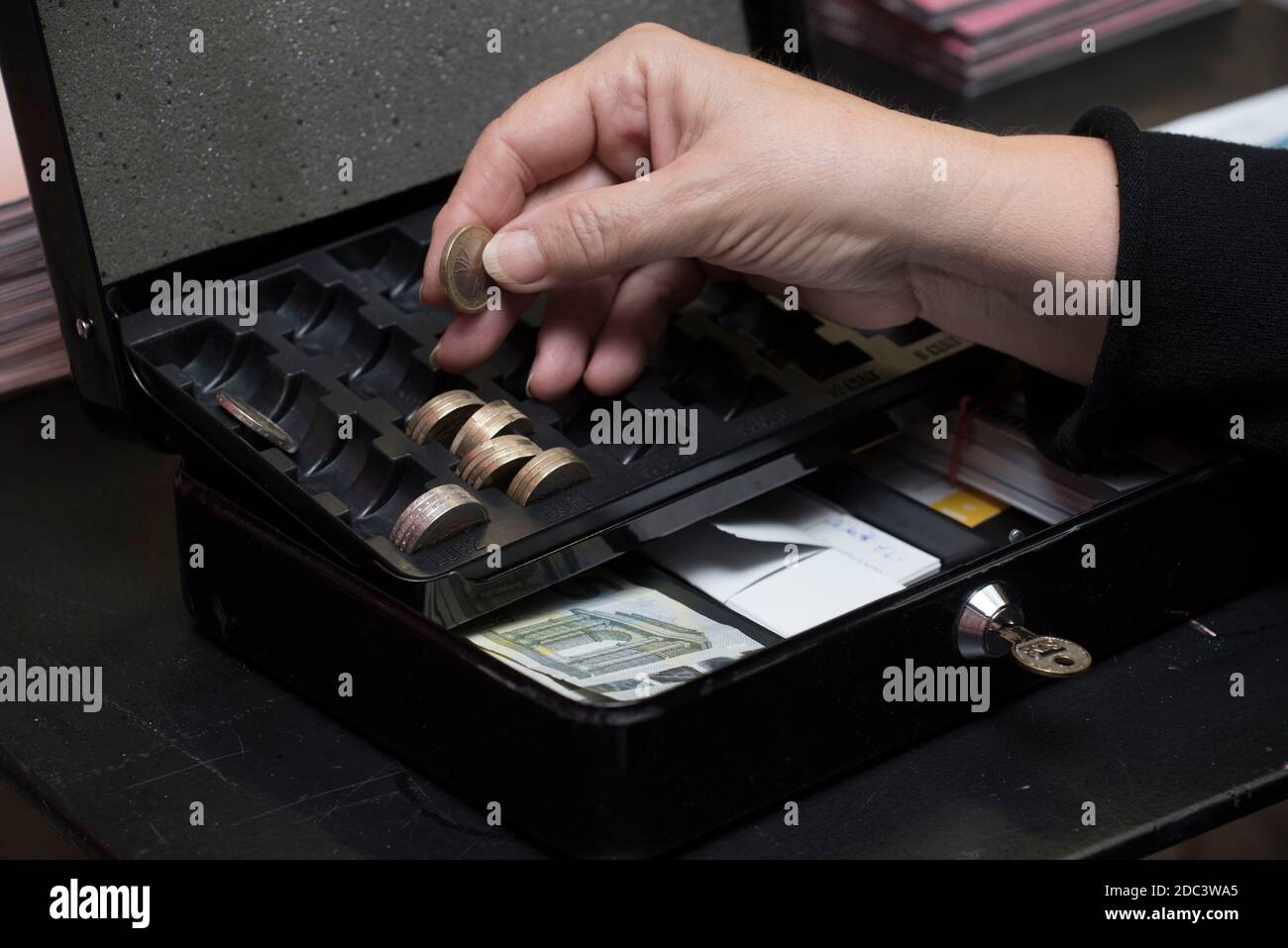 counting the money in the petty cash, coins and banknotes Stock Photo ...