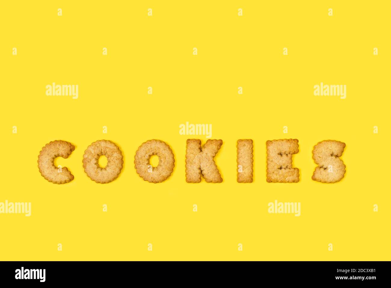 Cookies word write with alphabet letters cookies on a yellow background ...