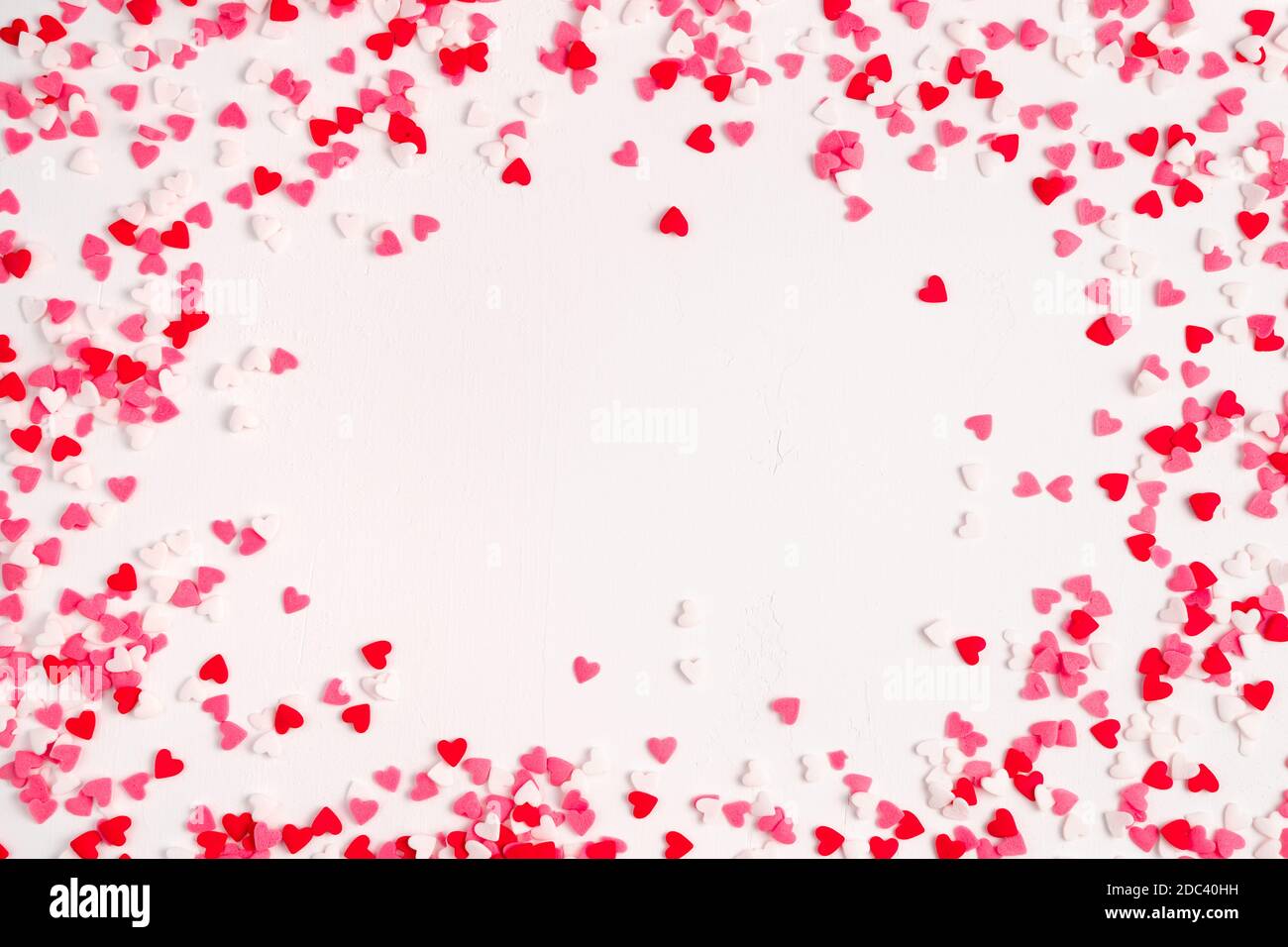 Lots of little red, pink and white hearts on a light background Stock ...