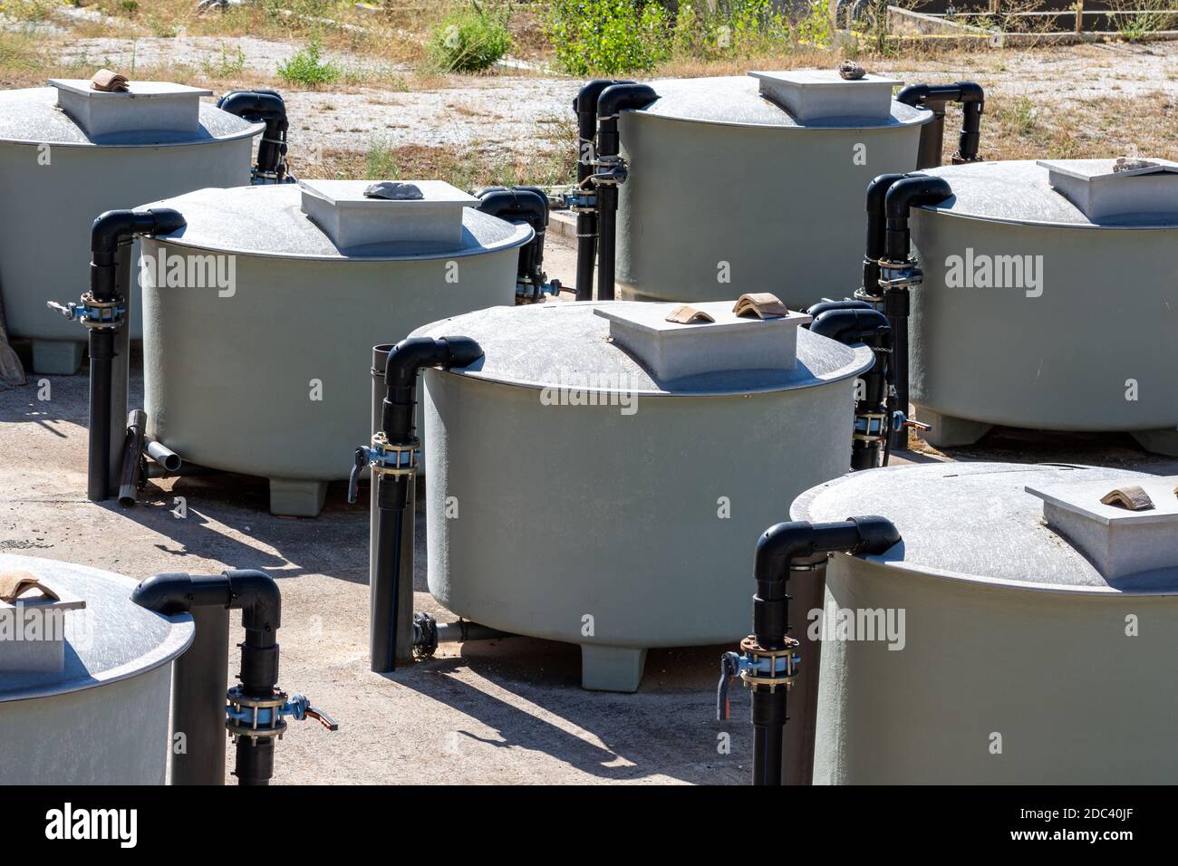 Water tanks for distribution and sustainability of a farm Stock Photo ...