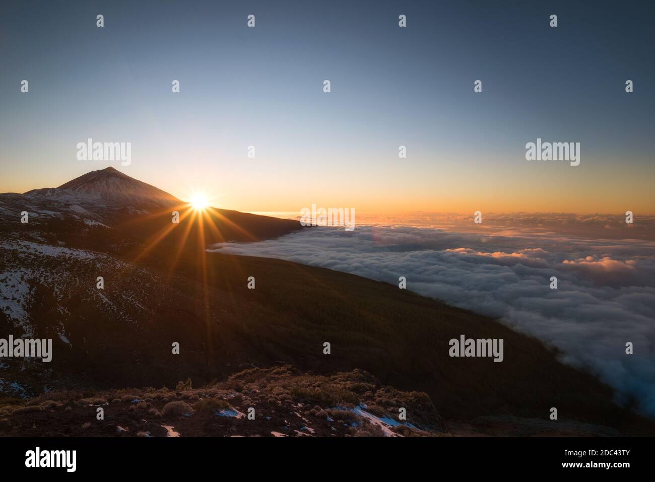 mountain landscape with clouds and sunset warm colors Stock Photo - Alamy