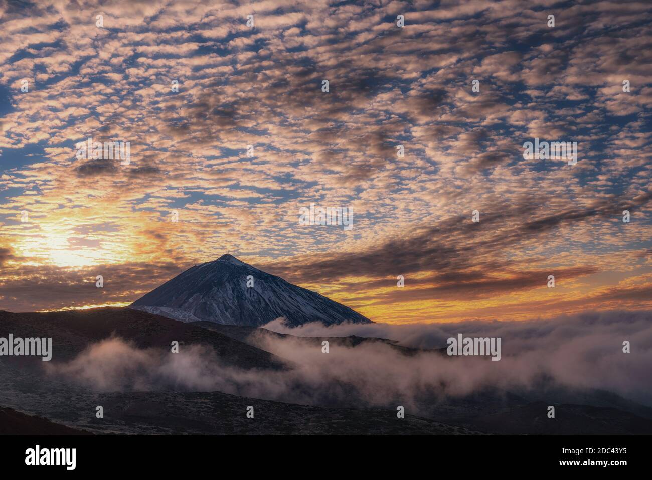 mountain landscape with clouds and sunset warm colors Stock Photo - Alamy