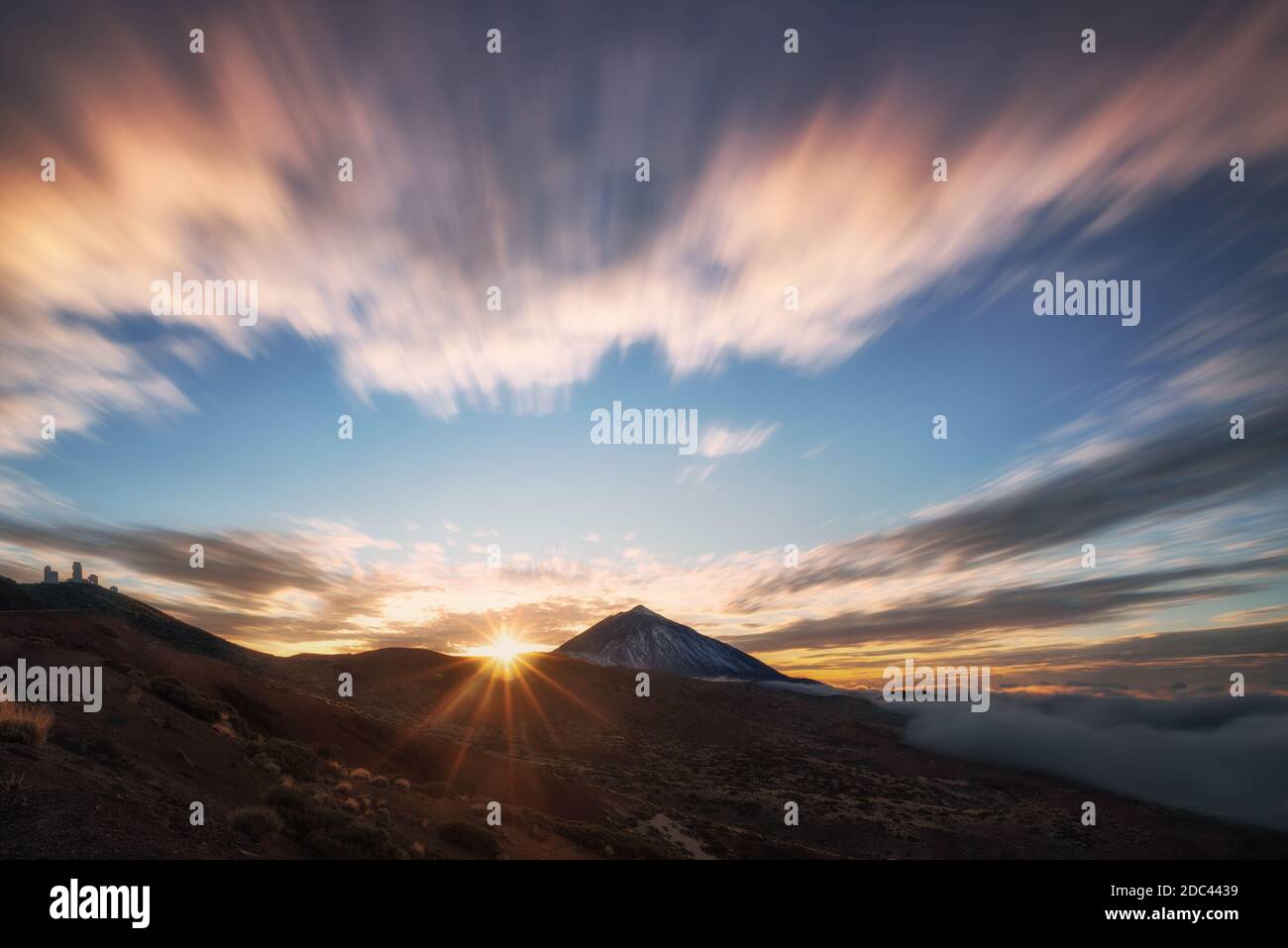 mountain landscape with clouds and sunset warm colors Stock Photo - Alamy