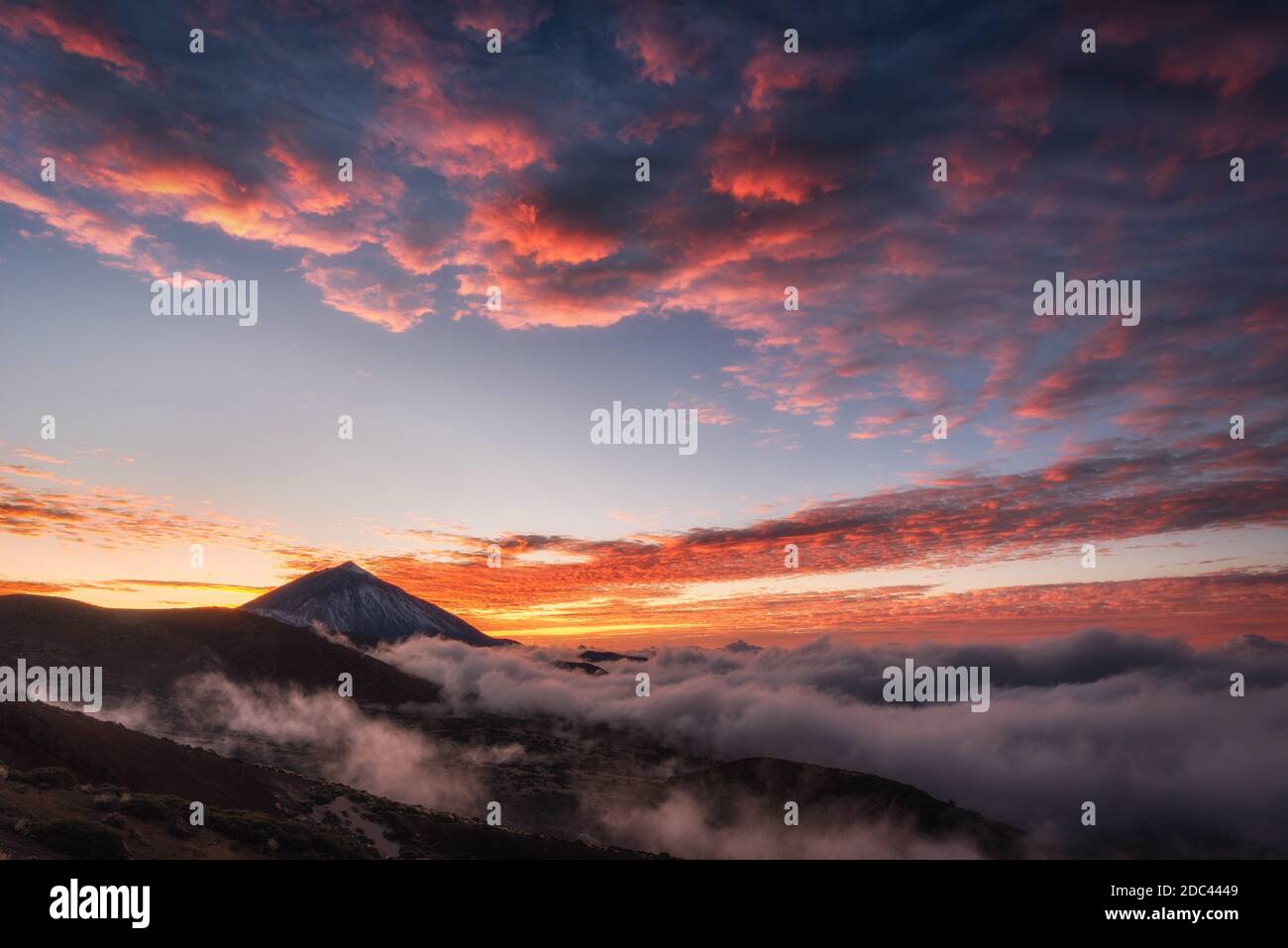 mountain landscape with clouds and sunset warm colors Stock Photo - Alamy