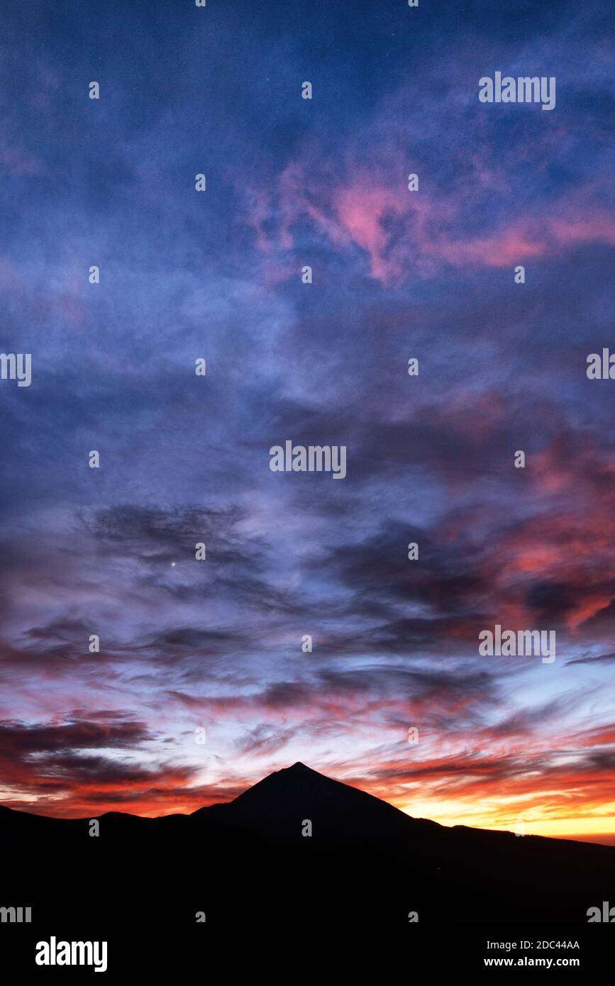 mountain landscape with clouds and sunset warm colors Stock Photo - Alamy