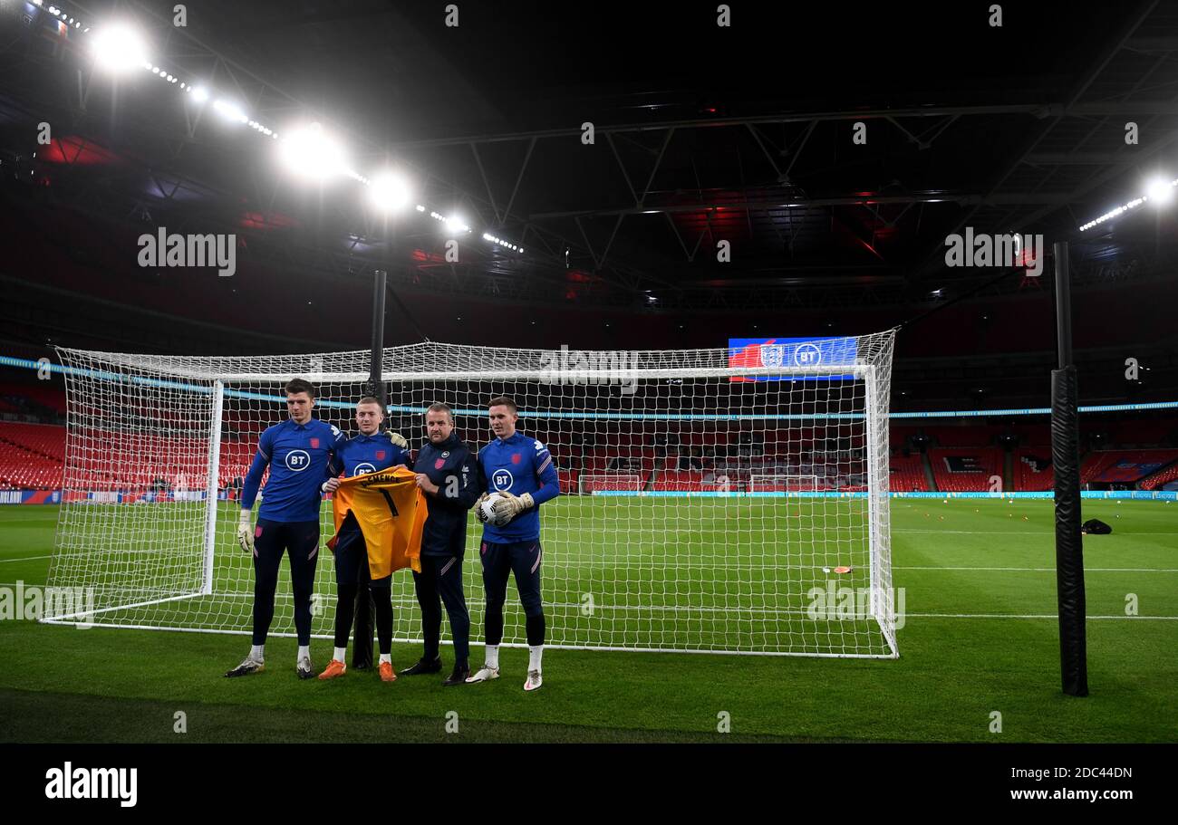 England goalkeepers Nick Pope (left), Jordan Pickford (second left) and ...