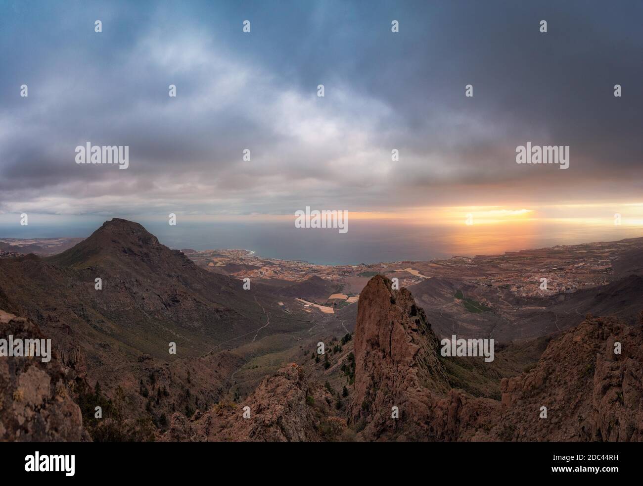 mountain landscape with clouds and sunset warm colors Stock Photo - Alamy