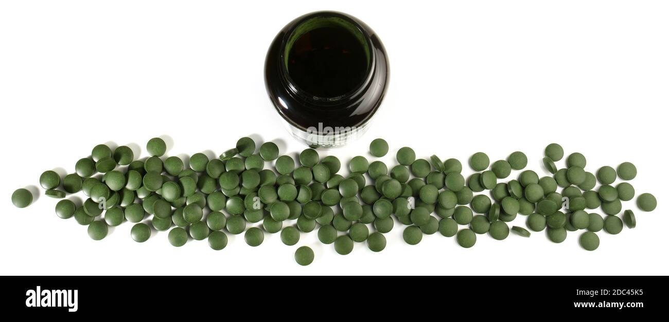 Chlorella Pills with Case Panorama isolated on white Background Stock ...