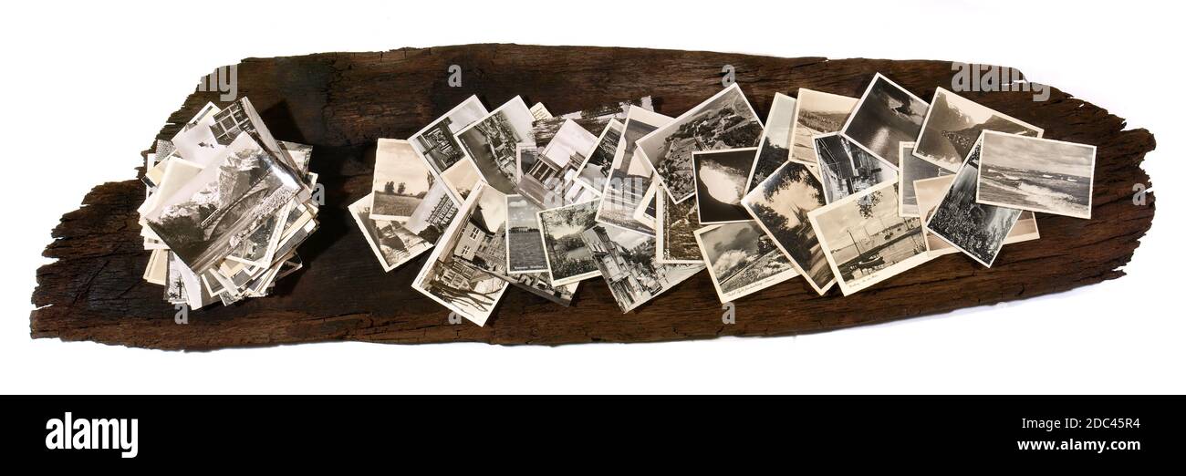 Old Nostalgic Postcards on a Vintage wodden Board Stock Photo - Alamy