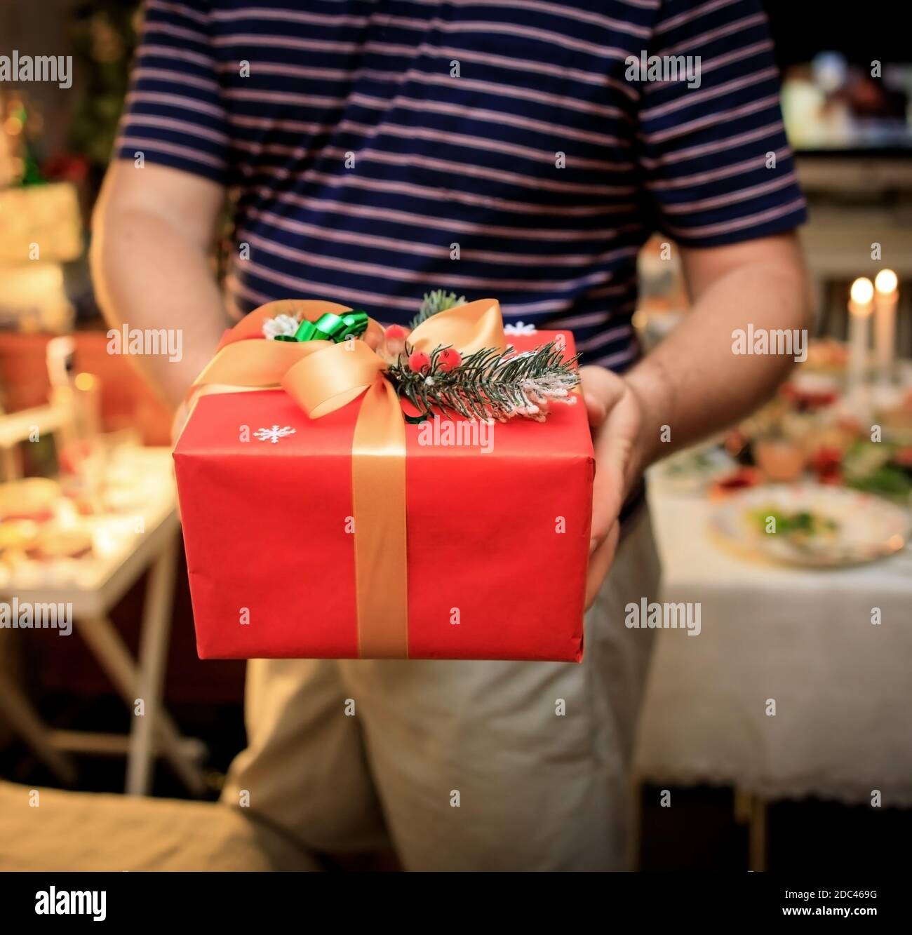 Woman Giving Presents Out High Resolution Stock Photography and Images ...