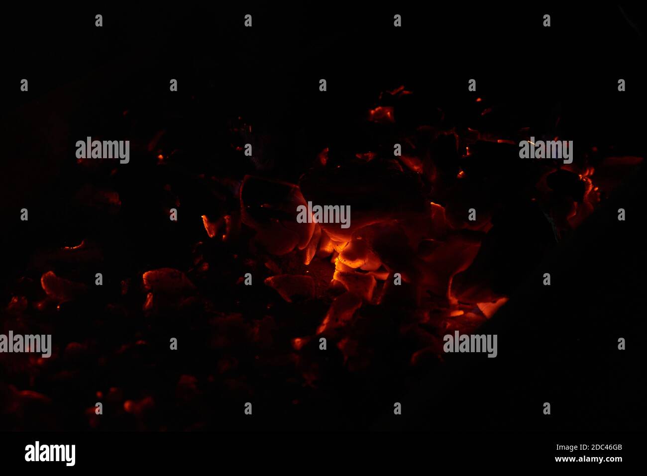 Red coals with black background Stock Photo - Alamy