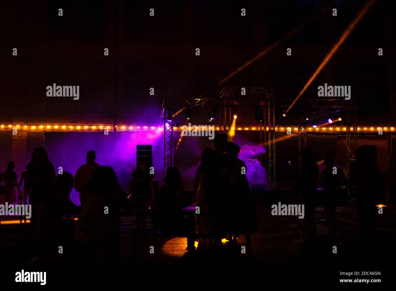 Night club party crowd hands up Stock Photo - Alamy
